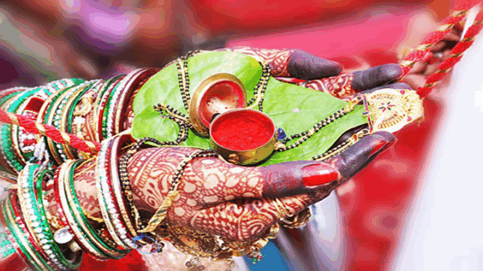 Sindoor the Red vermillion powder, worn by married Hindu Women on their ...