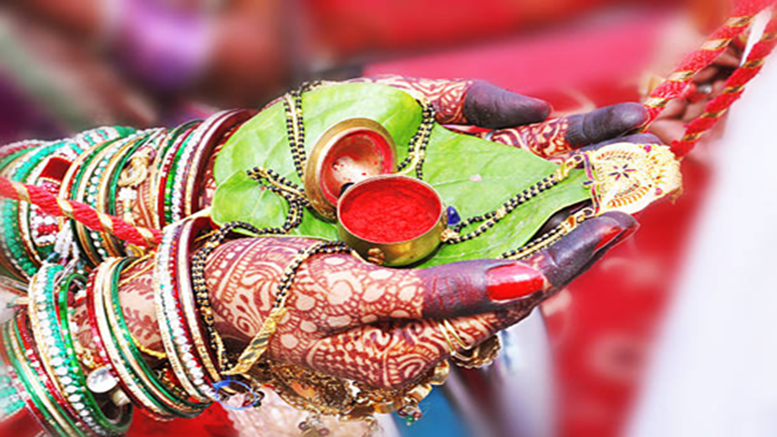 Sindoor the Red vermillion powder, worn by married Hindu Women on their ...